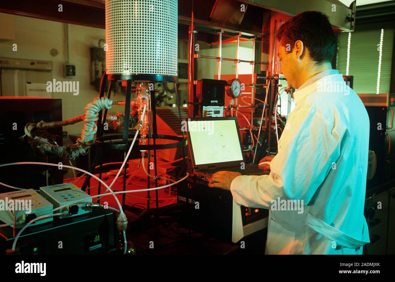 Fuel cell research. Researcher studying methods of producing hydrogen ...