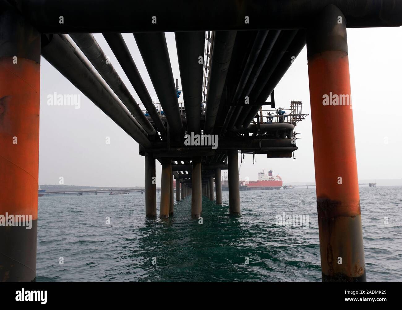 Jetty at liquefied natural gas terminal. An old jetty at a gas terminal ...
