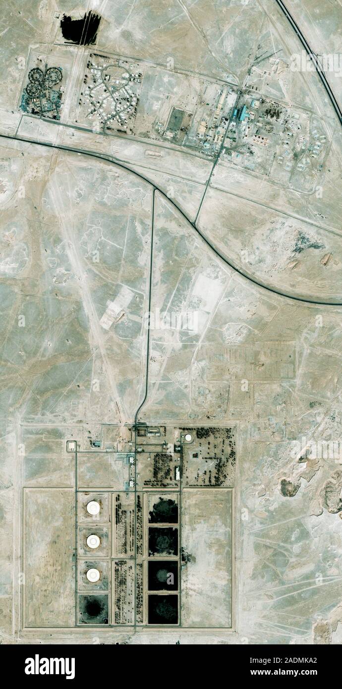 Oil tank farm, Iraq. Satellite image of an oil tank farm in Tubah, Iraq ...