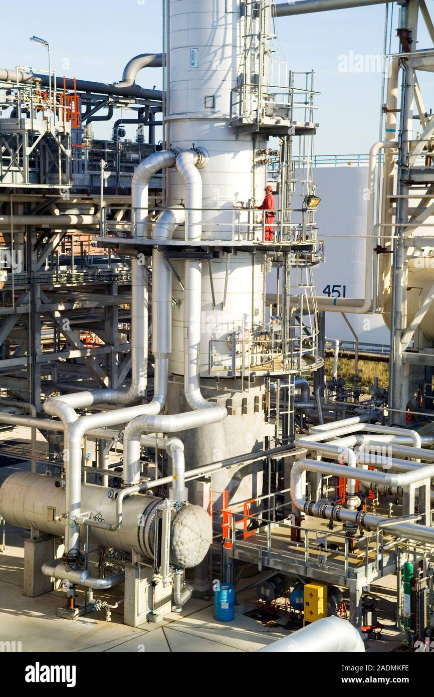 Splitter tower at an oil refinery. This unit is part of the hydrofining ...