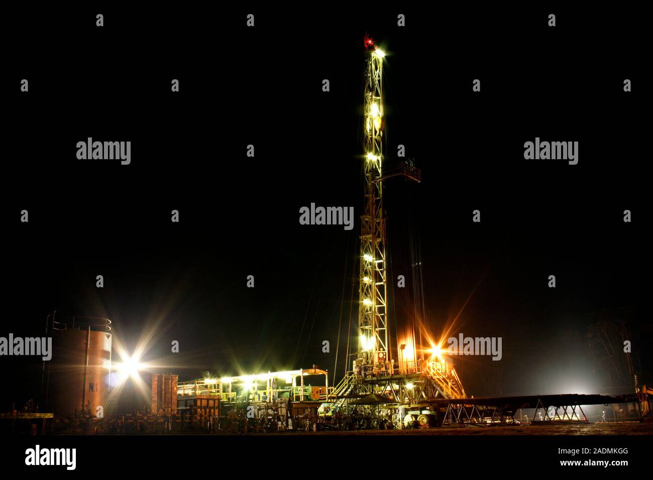 Iro-A oil platform, Ecuadorian Amazon, illuminated at night. The ...