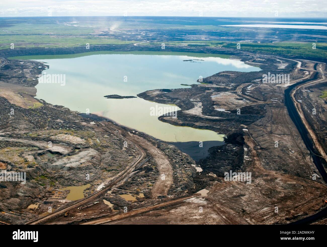 Settling pond. Aerial photograph of a settling pond in the Athabasca ...