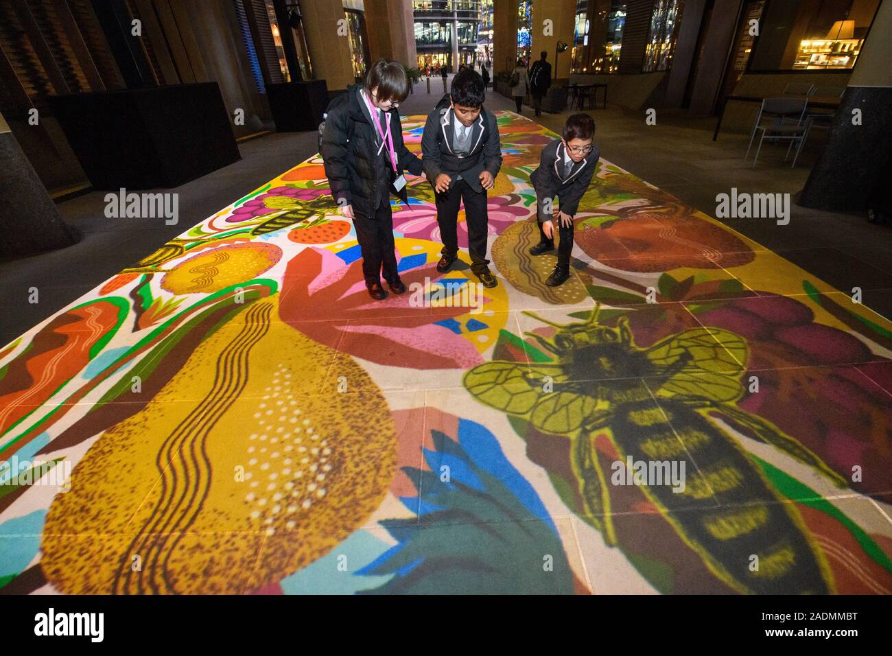 EMBARGOED UNTIL 0001 THURSDAY DECEMBER 5 Passers-by interact with ...