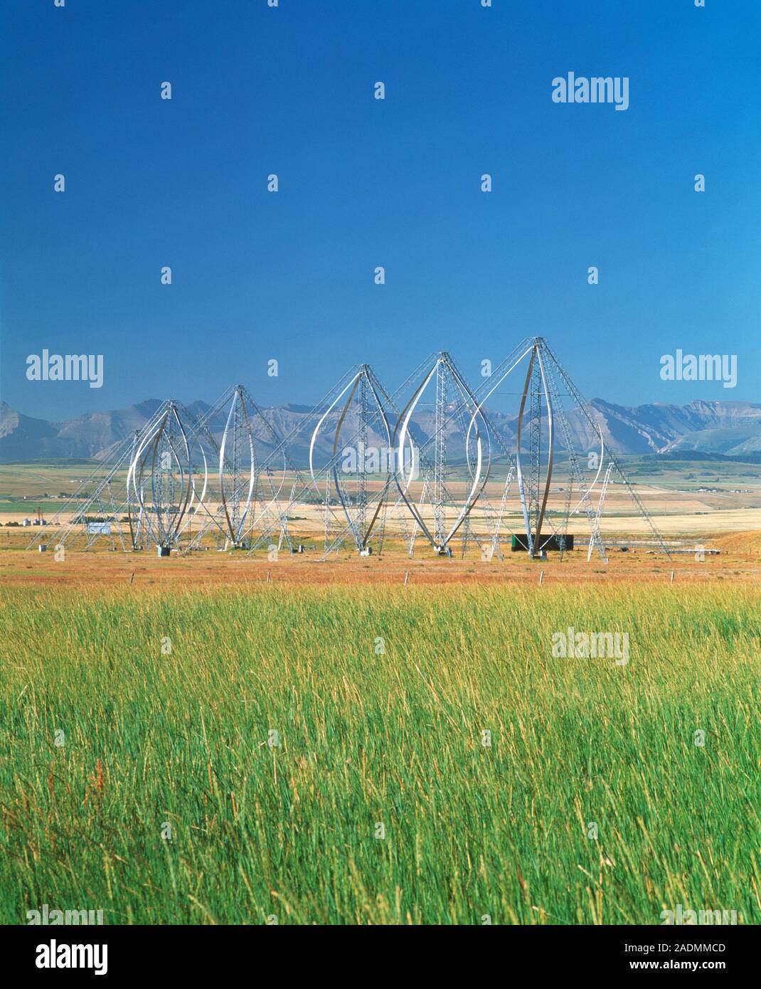 Wind turbines. Darrieus vertical axis wind turbines (VAWT). Each has ...