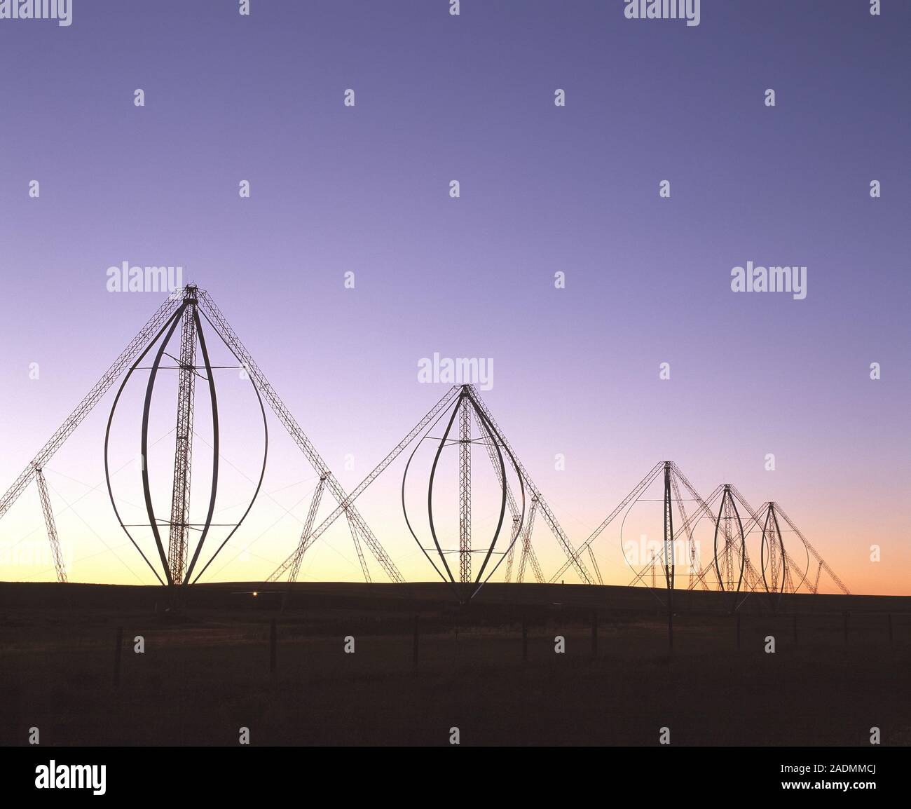 Wind turbines. Darrieus vertical axis wind turbines (VAWT). Each has ...