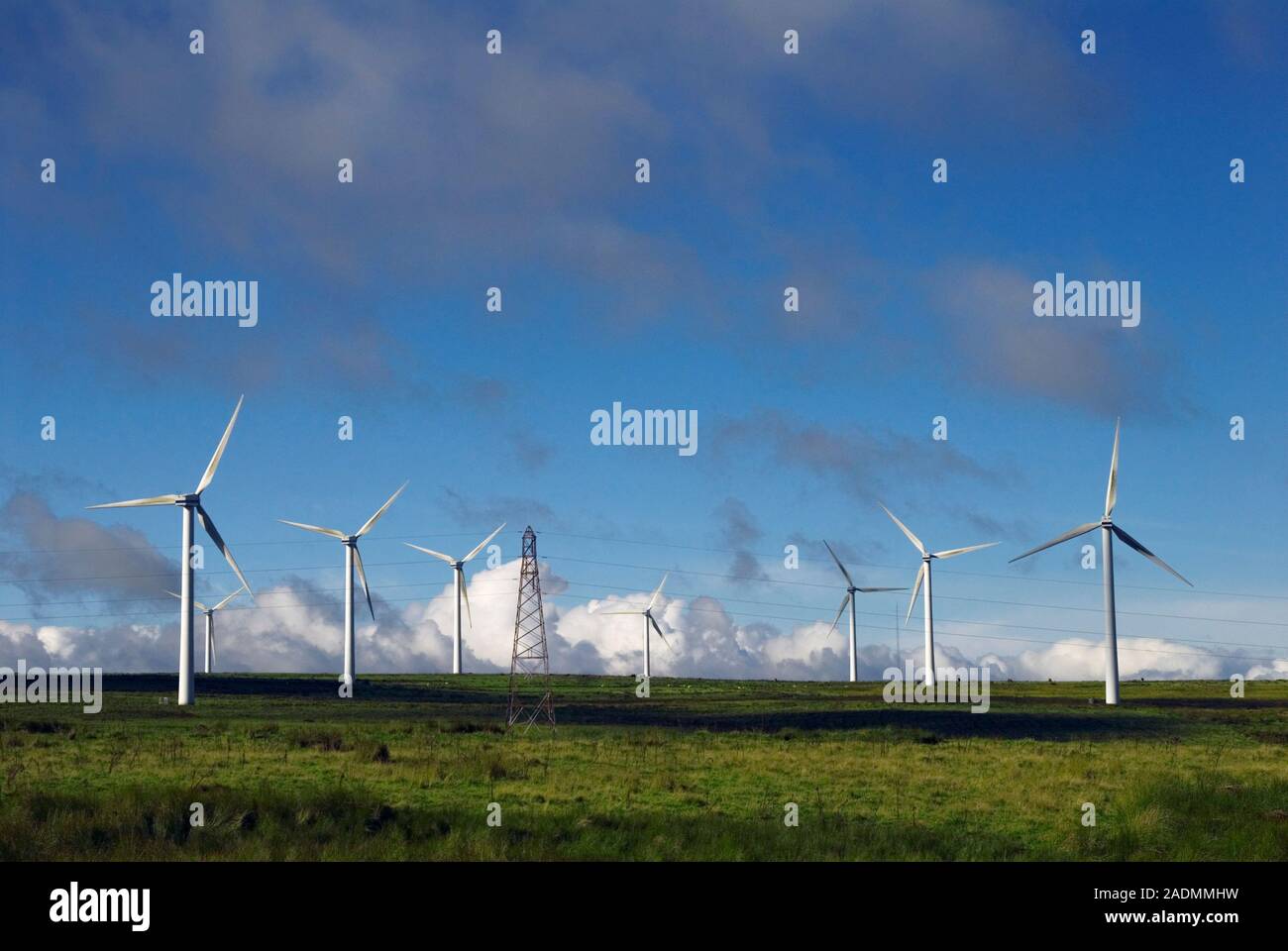 Wind turbines and pylon. Wind power is a renewable and clean source of ...