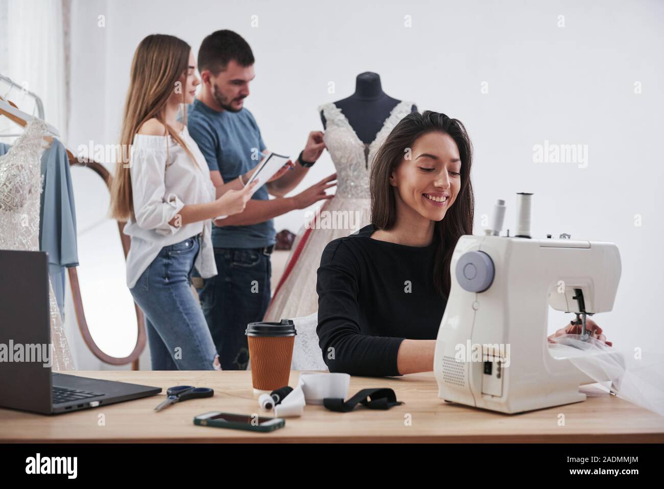 Making your dreams real. Female fashion designer works on the new ...