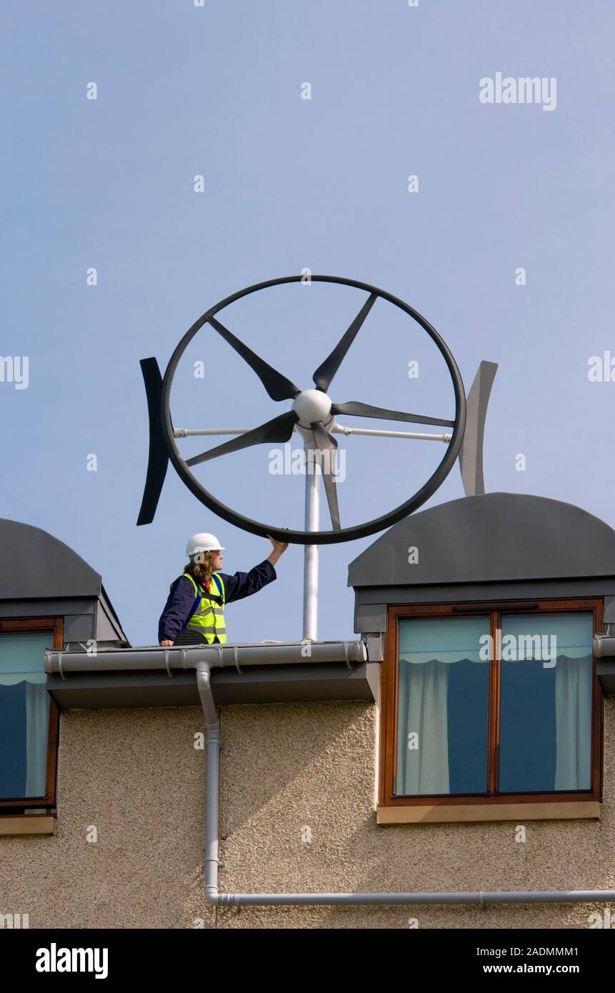 MODEL RELEASED. Rooftop wind energy system being installed on the roof ...