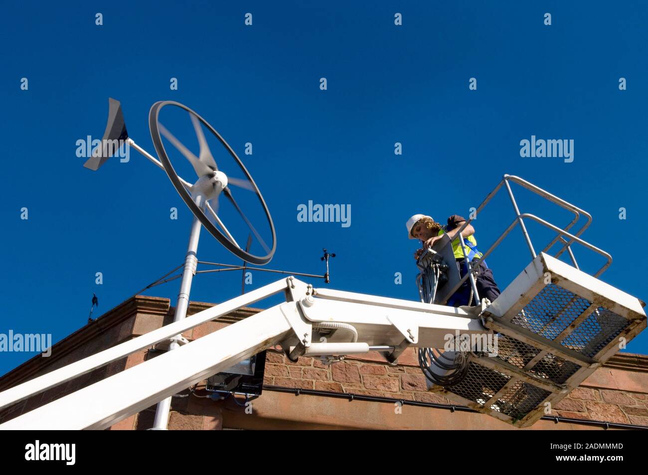 MODEL RELEASED. Rooftop wind energy system being installed on the roof ...