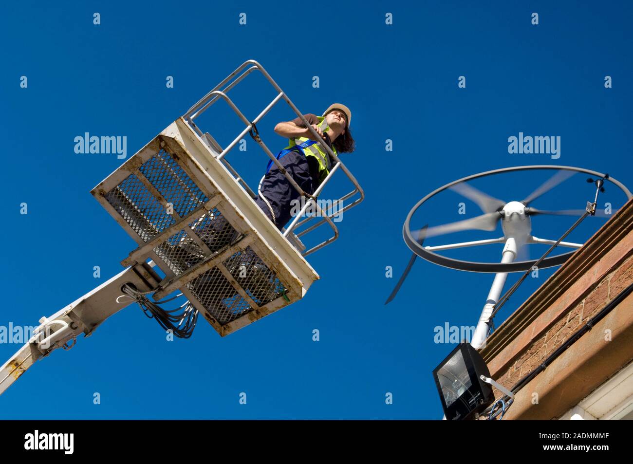 MODEL RELEASED. Rooftop wind energy system being installed on the roof ...