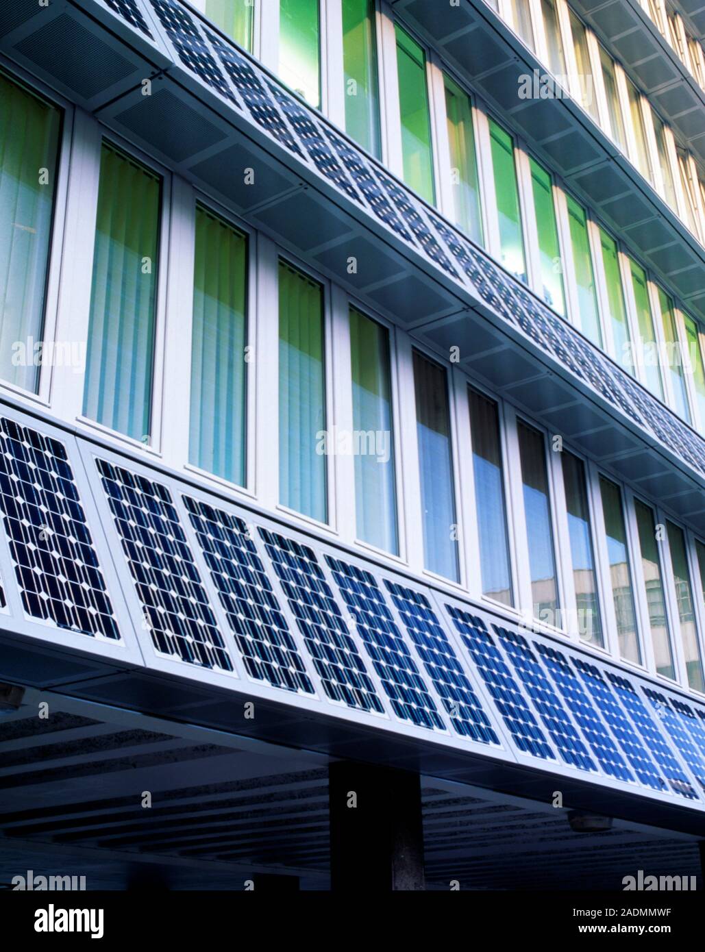 Solar power in architecture. View of solar panels on the facade of a ...