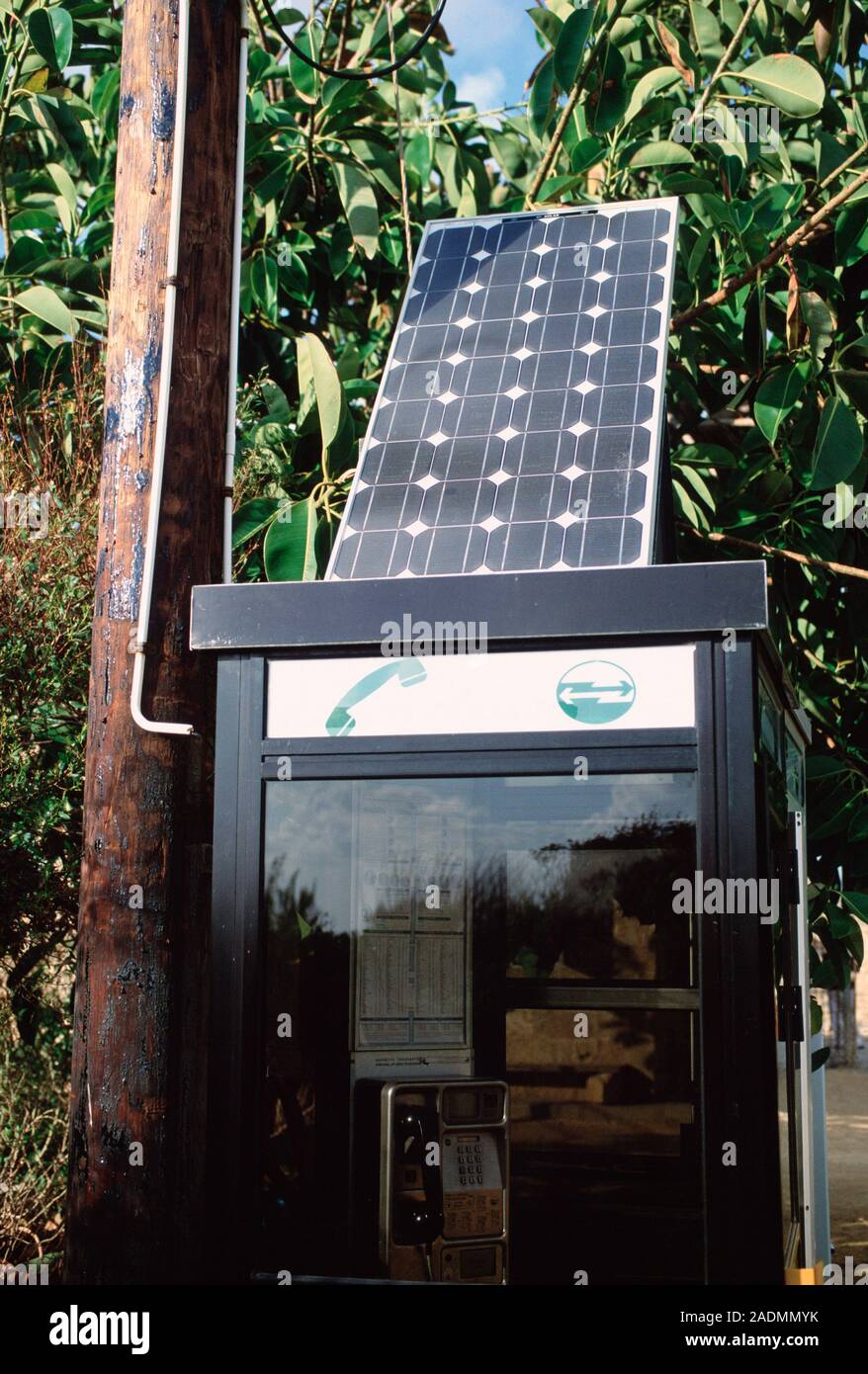 Solar-powered telephone box. Public telephone with a solar panel. These ...