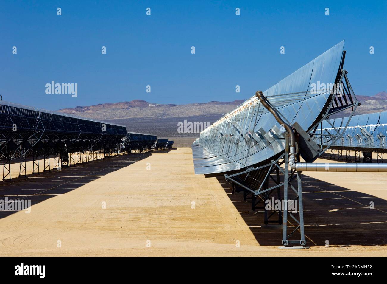 Solar parabolic mirror. Close-up of a solar energy generating systems ...