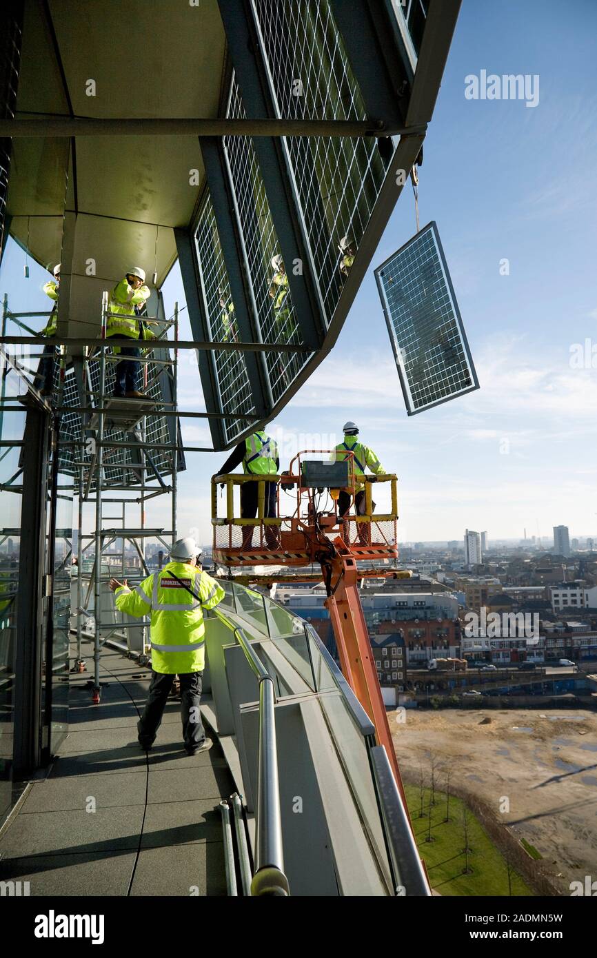 Solar panels on City Hall, London, UK. Photovoltaic solar panels being ...
