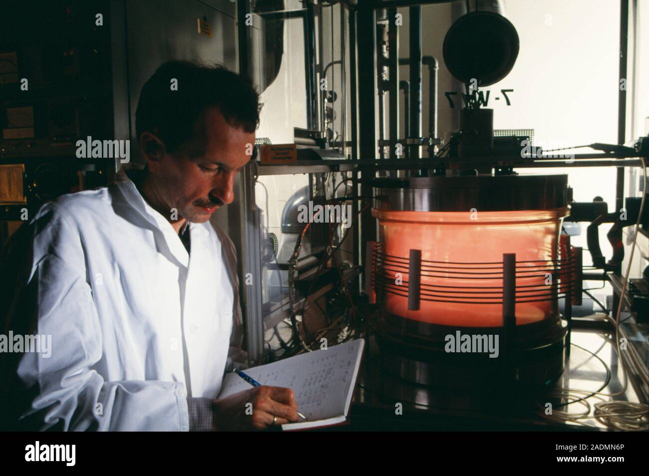 Solar panel research. Researcher with laboratory apparatus working on ...