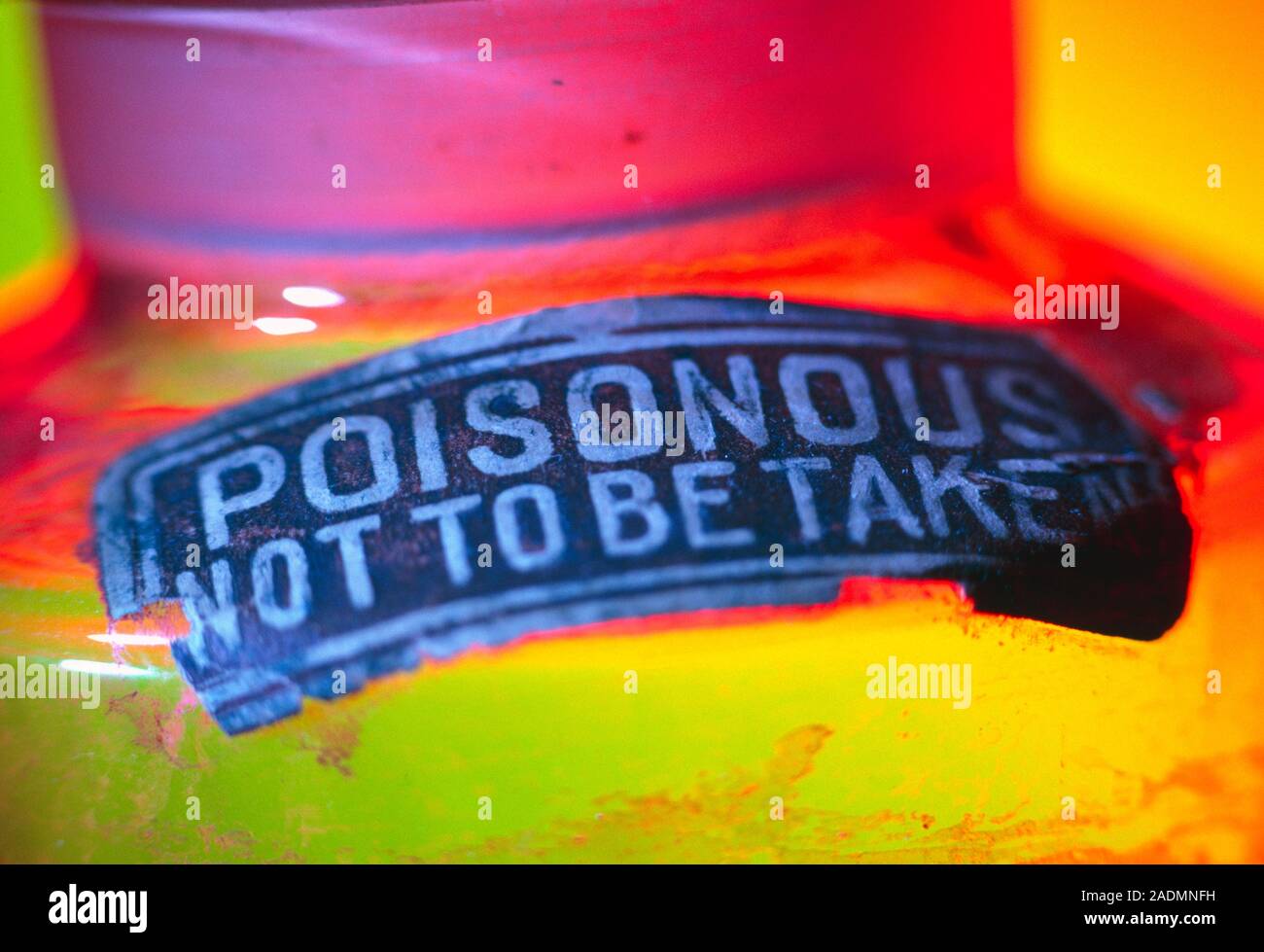 Poison sign. Label reading Poisonous. Not to be taken" on a stoppered ...