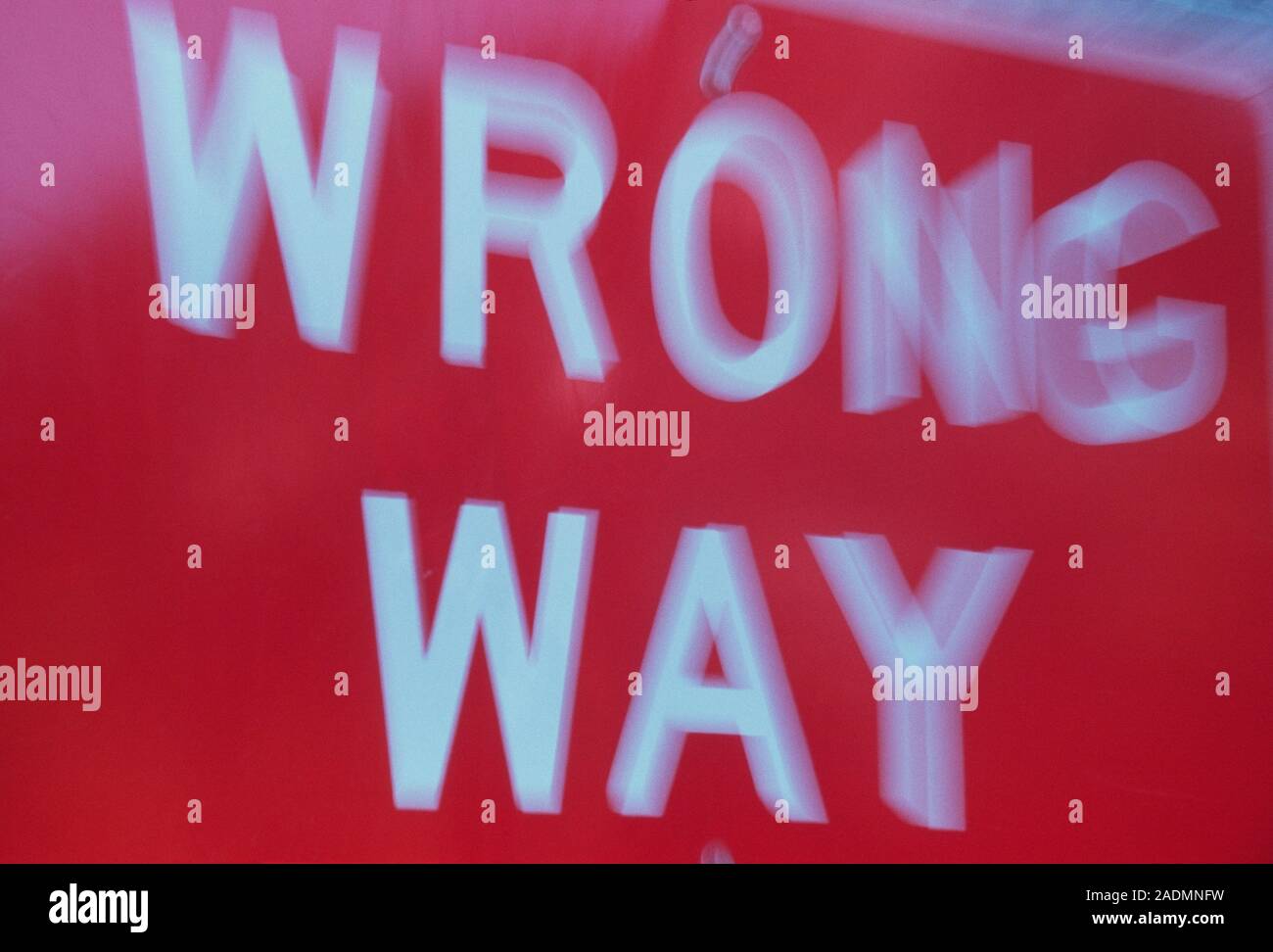 Wrong way road sign. Photographed in the USA Stock Photo - Alamy