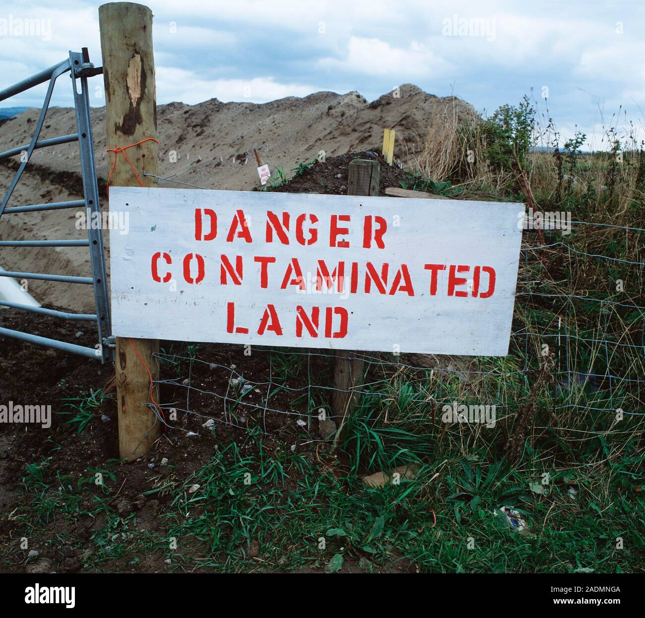 Contaminated land warning sign marking the site of a demolished former ...
