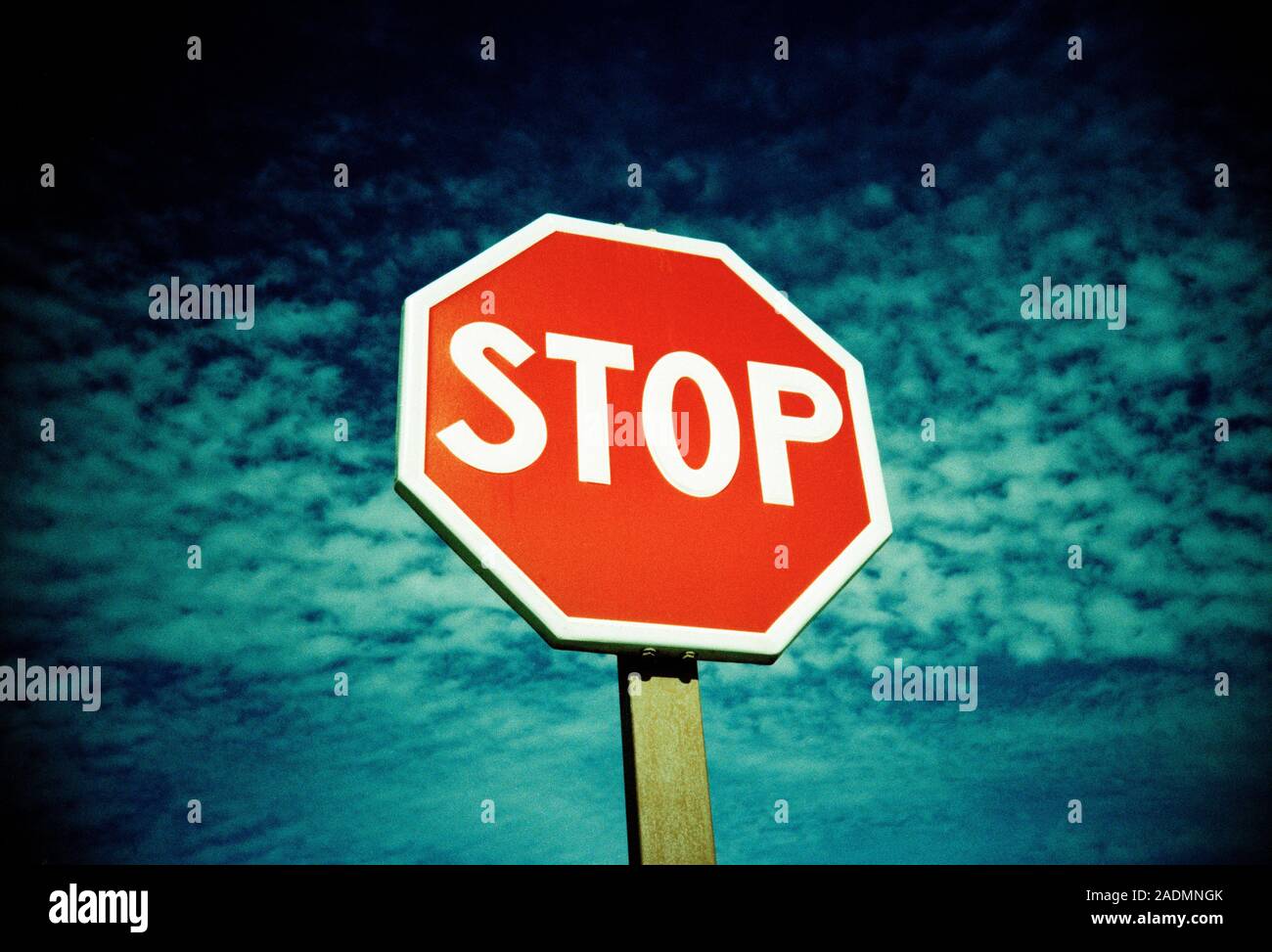Stop sign on a roadside warning drivers to halt Stock Photo - Alamy