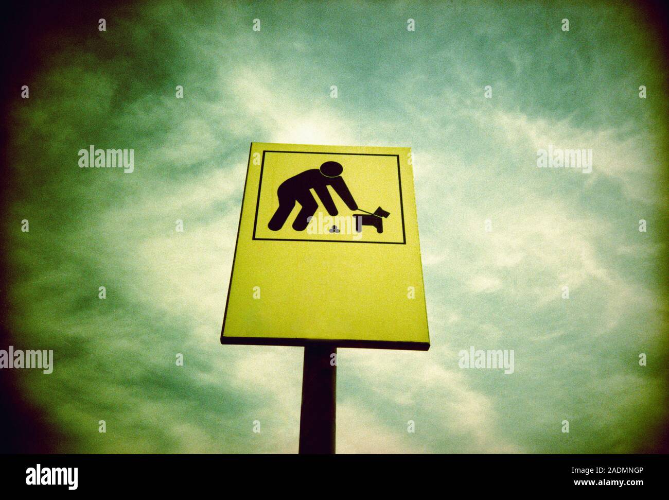 Dog fouling sign advising dog owners to pick up their pet's faeces ...