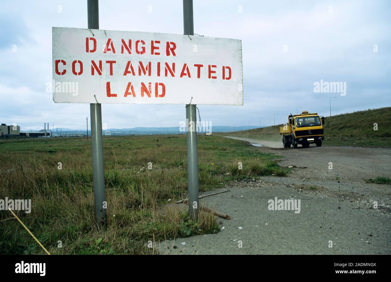 Contaminated land warning sign. Warning sign on the site of the former ...