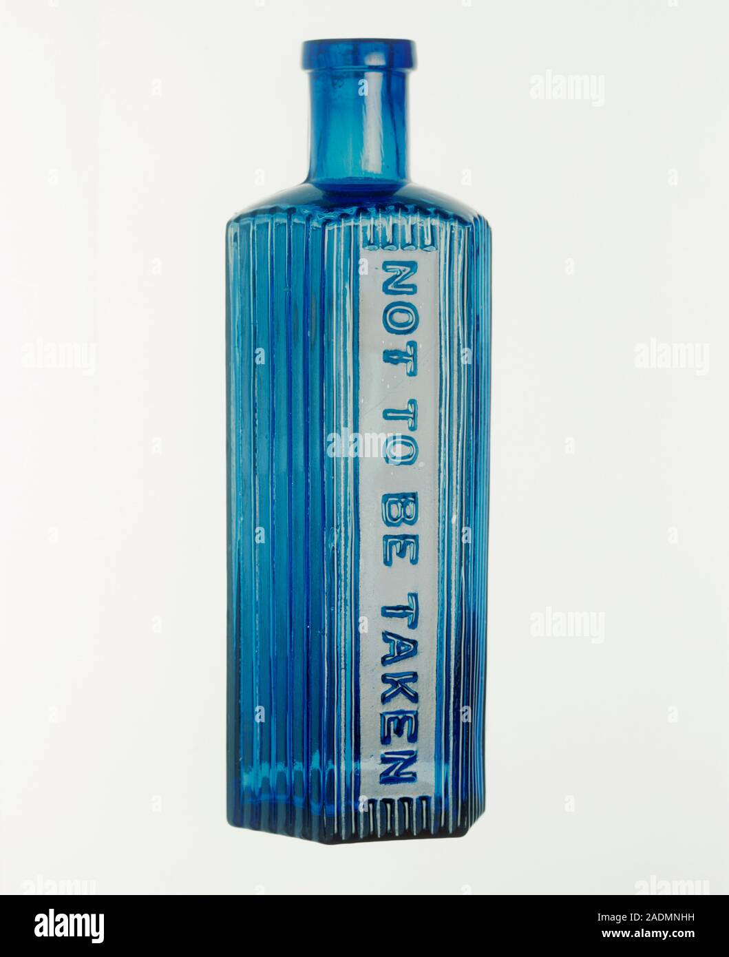 Antique poison bottle with not to be taken" warning sign Stock Photo ...