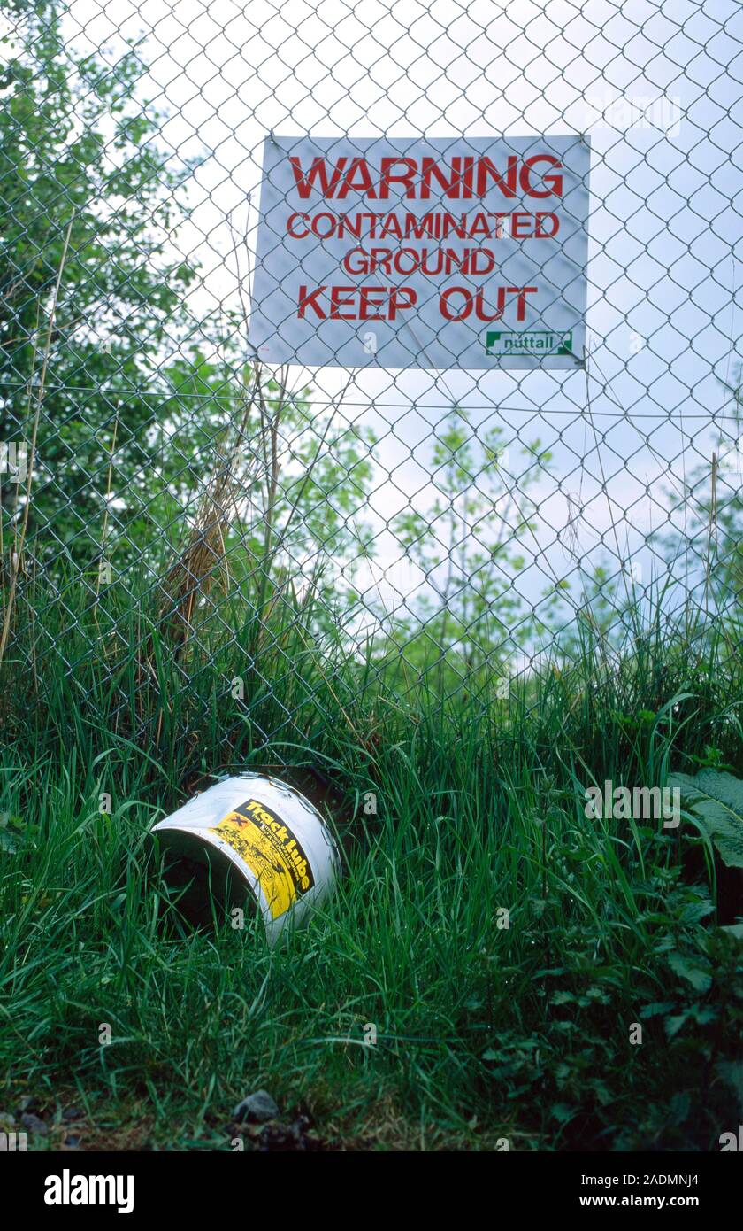 Contaminated ground warning sign at the site of a former gas works ...