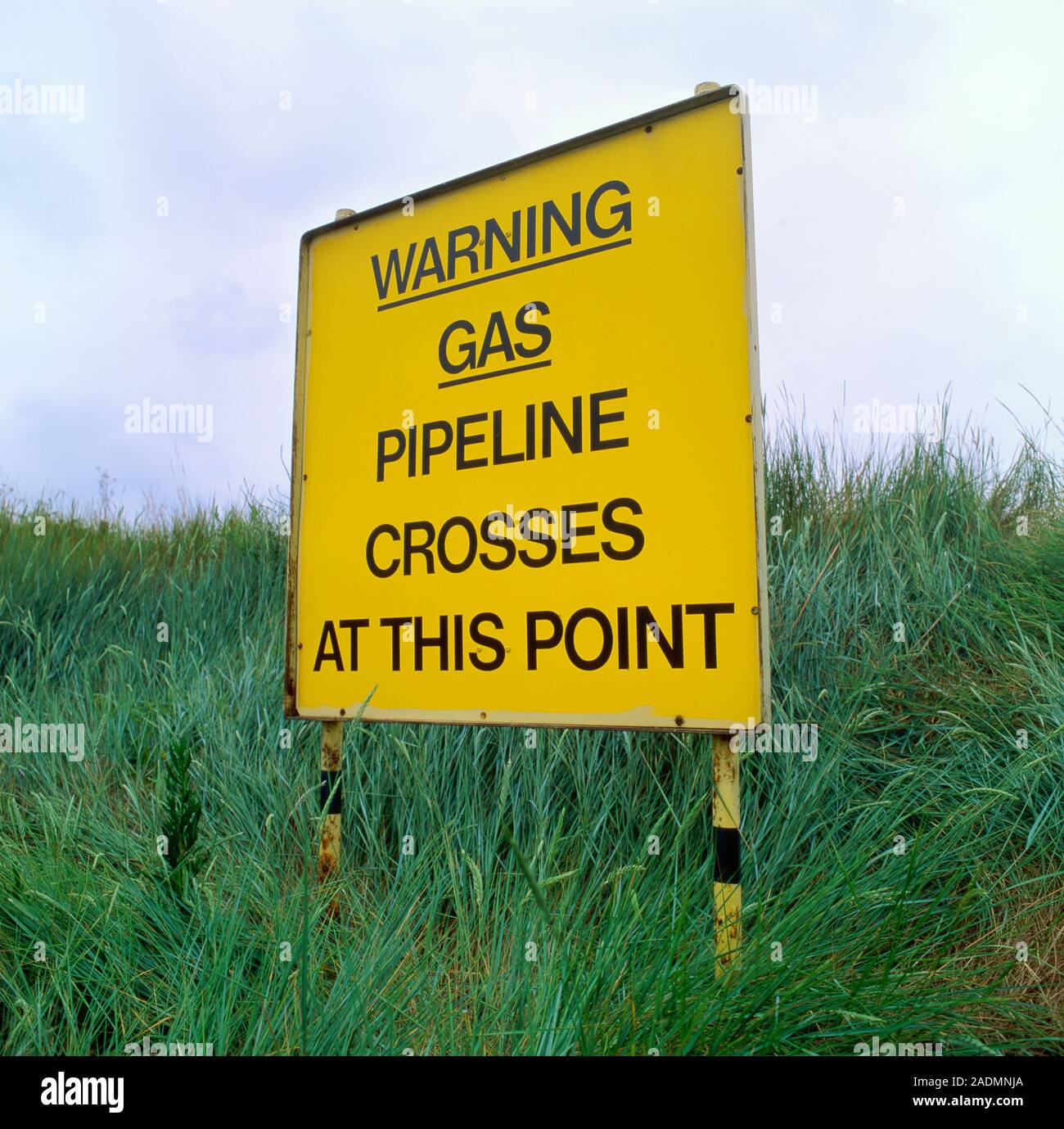 Gas pipeline. Sign indicating the presence of an underground high ...
