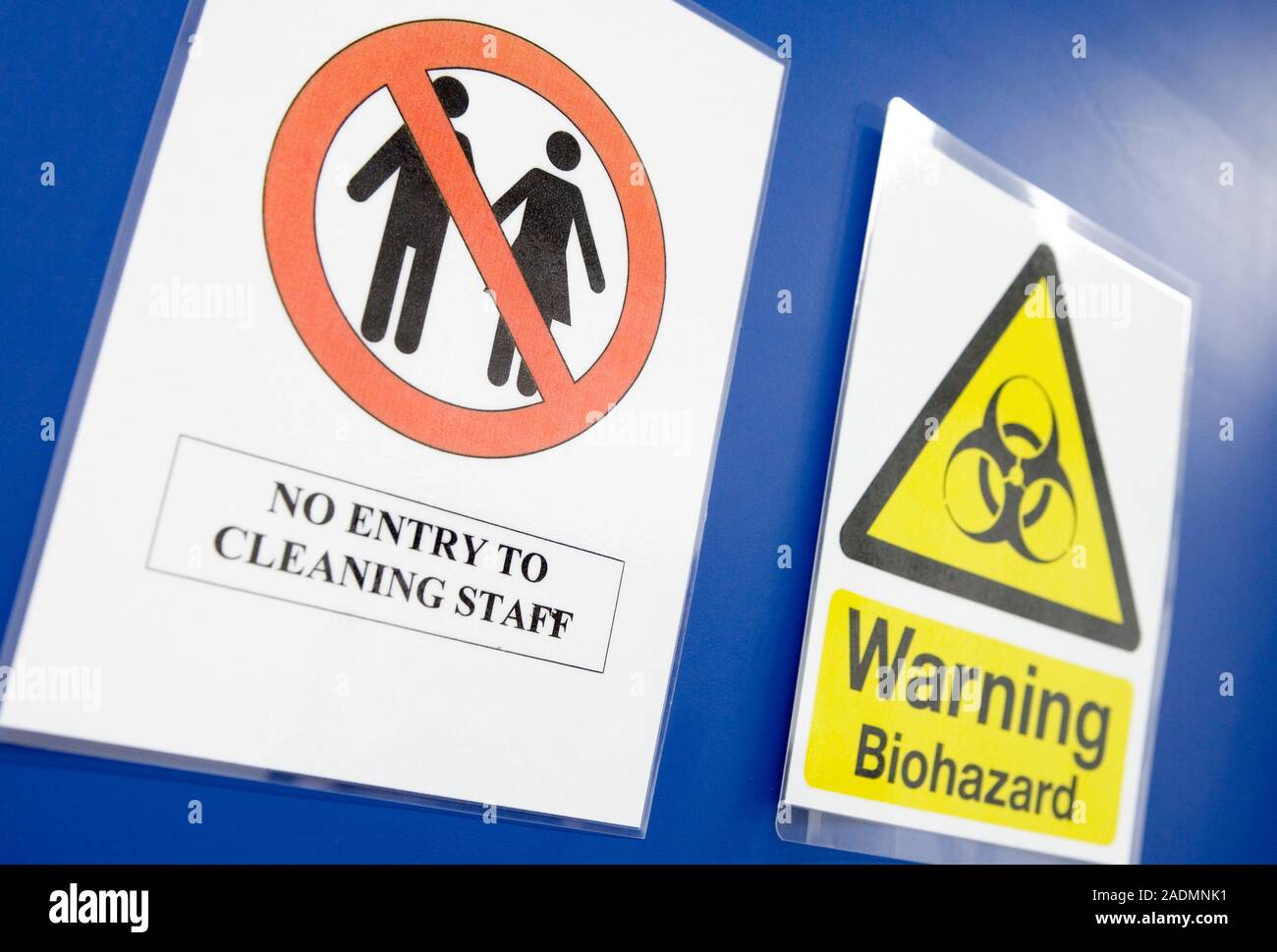 Laboratory warning signs. Biohazard warning sign (right) and a sign ...