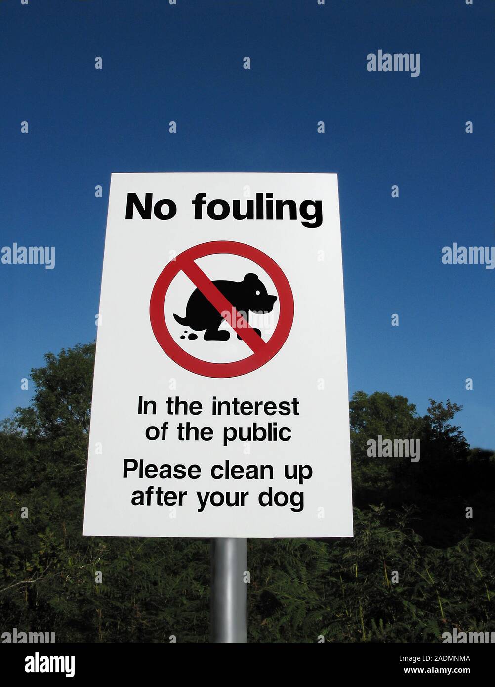 No fouling sign. Sign in a public space indicating that dog fouling is ...