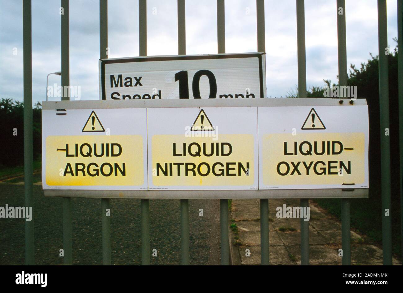 Dangerous chemicals warning signs. Notice on a gate at the entrance to ...