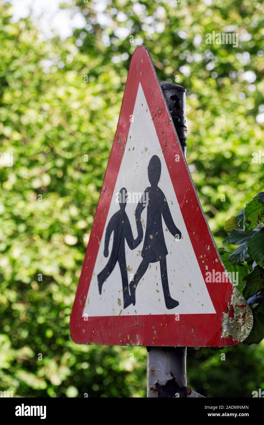 Children crossing road sign Stock Photo - Alamy