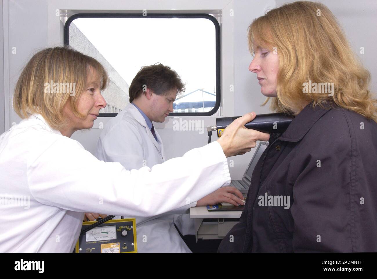 MODEL RELEASED. Radiation probe. Scientist using a sodium iodide ...