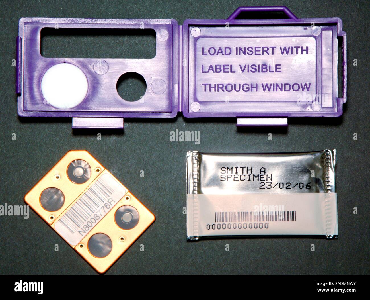 Personal radiation dose meter (dosimeter). This is a thermoluminescent ...