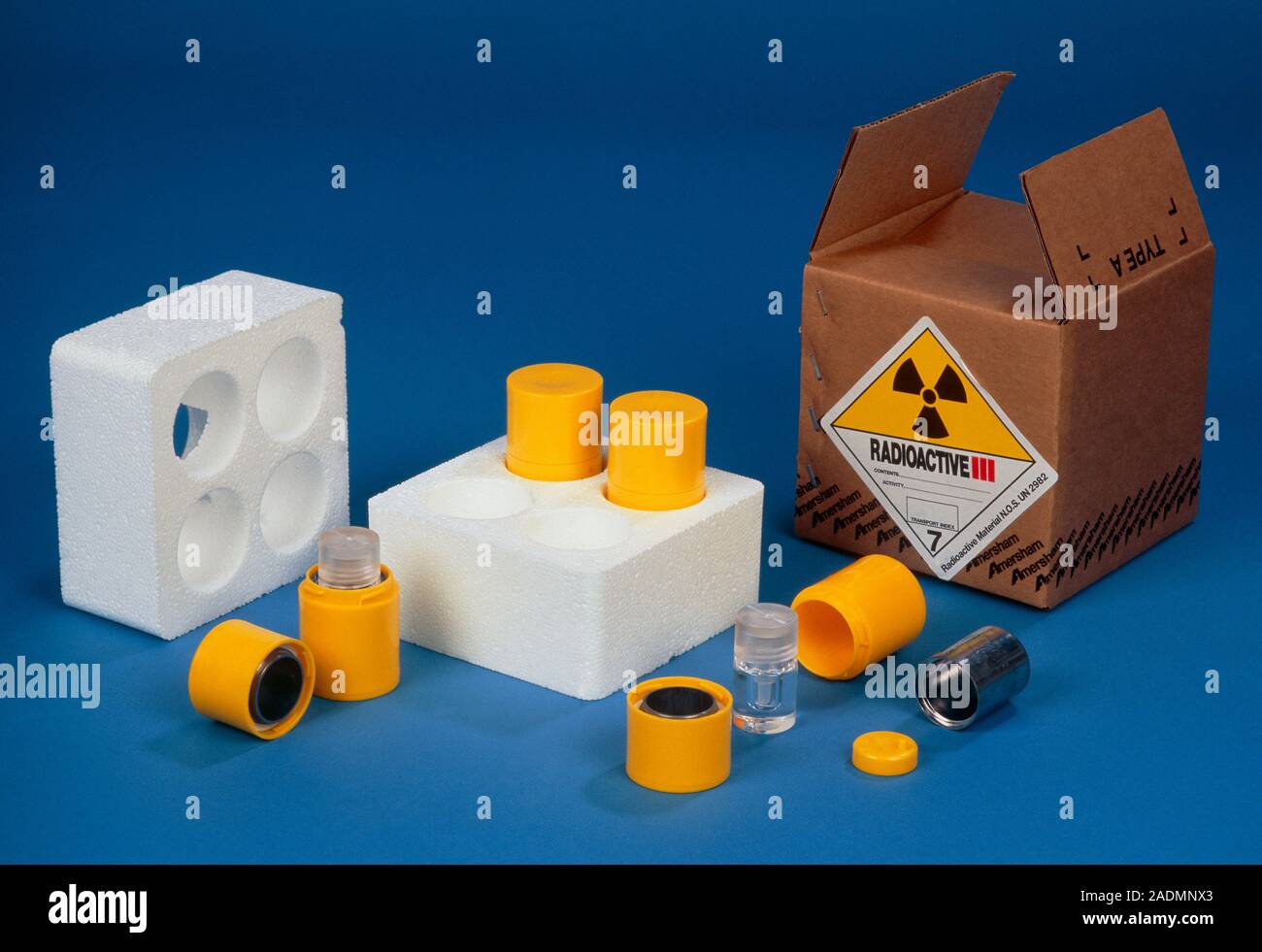 Packaging for radioactive items. The cardboard box (right) has a ...
