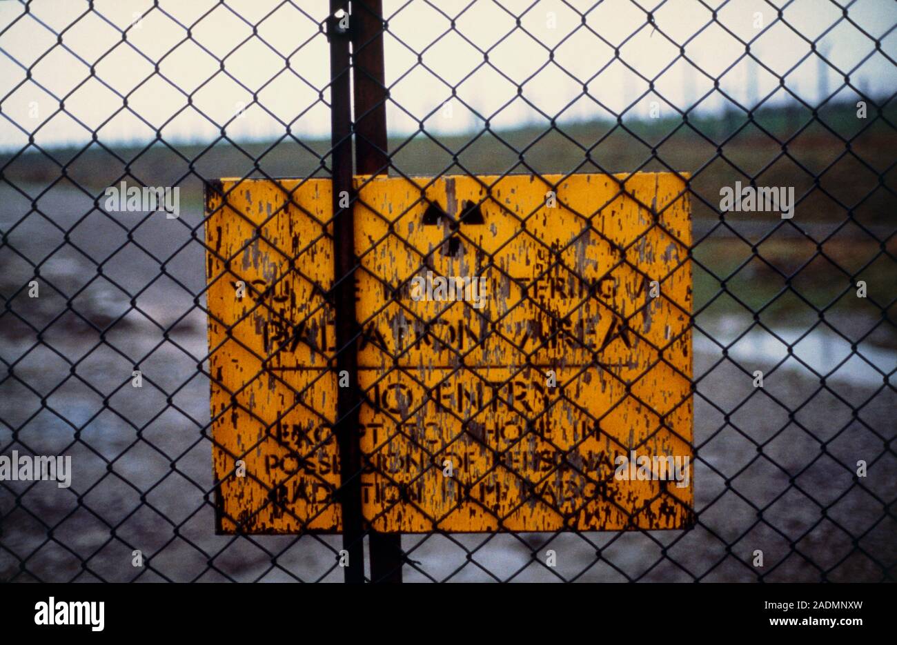 Radiation warning sign on a perimeter fence at Sellafield (Windscale ...