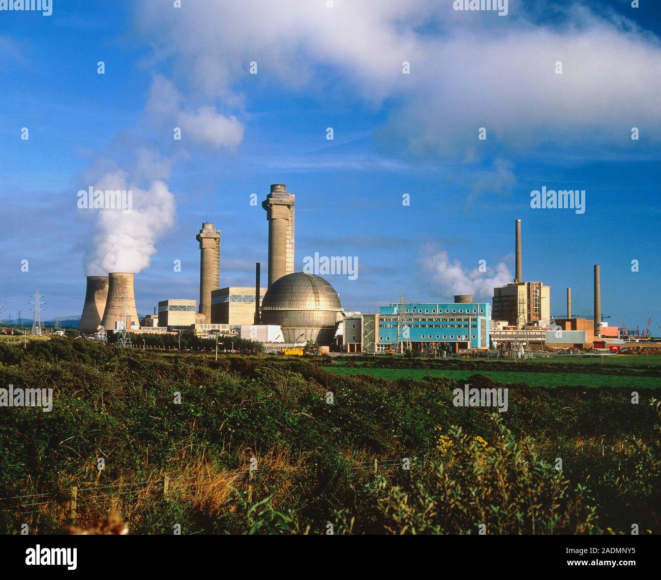 Sellafield nuclear plant, Cumbria, England. On the left are the cooling ...