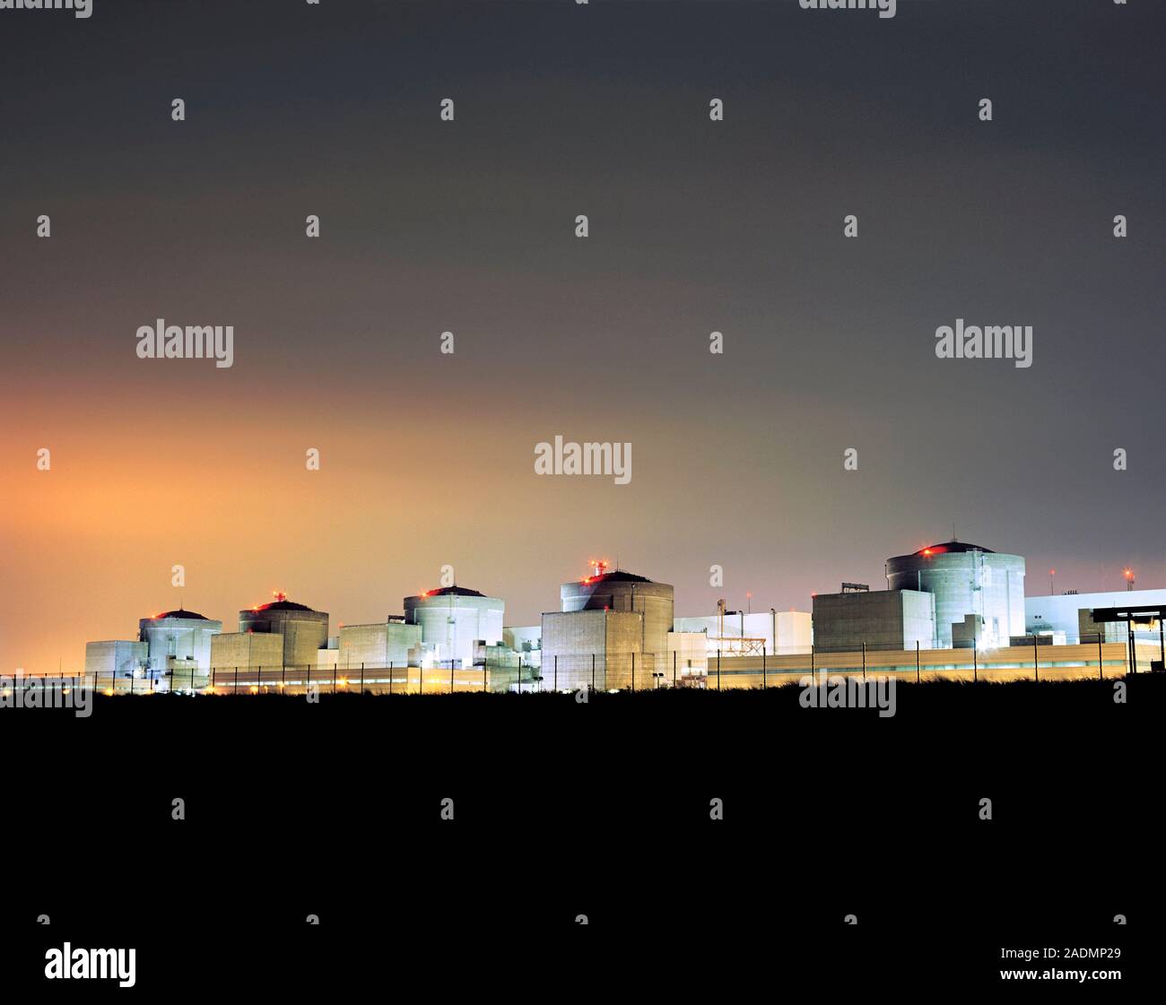 Nuclear power station at night. Gravelines pressurized water reactor ...