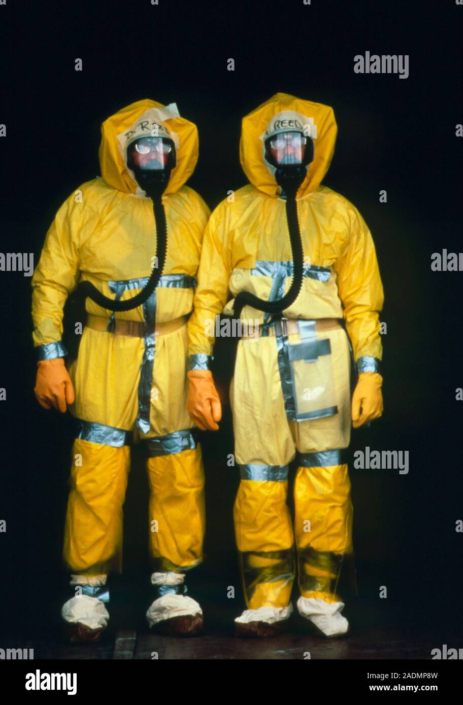 Two workers wear special protective radiation suits" for ...