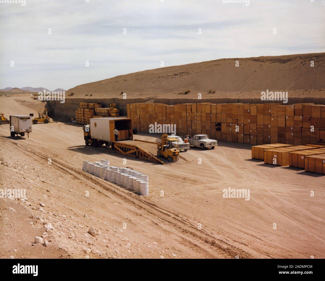 Nuclear waste storage. Nuclear waste in plywood boxes & steel drums ...