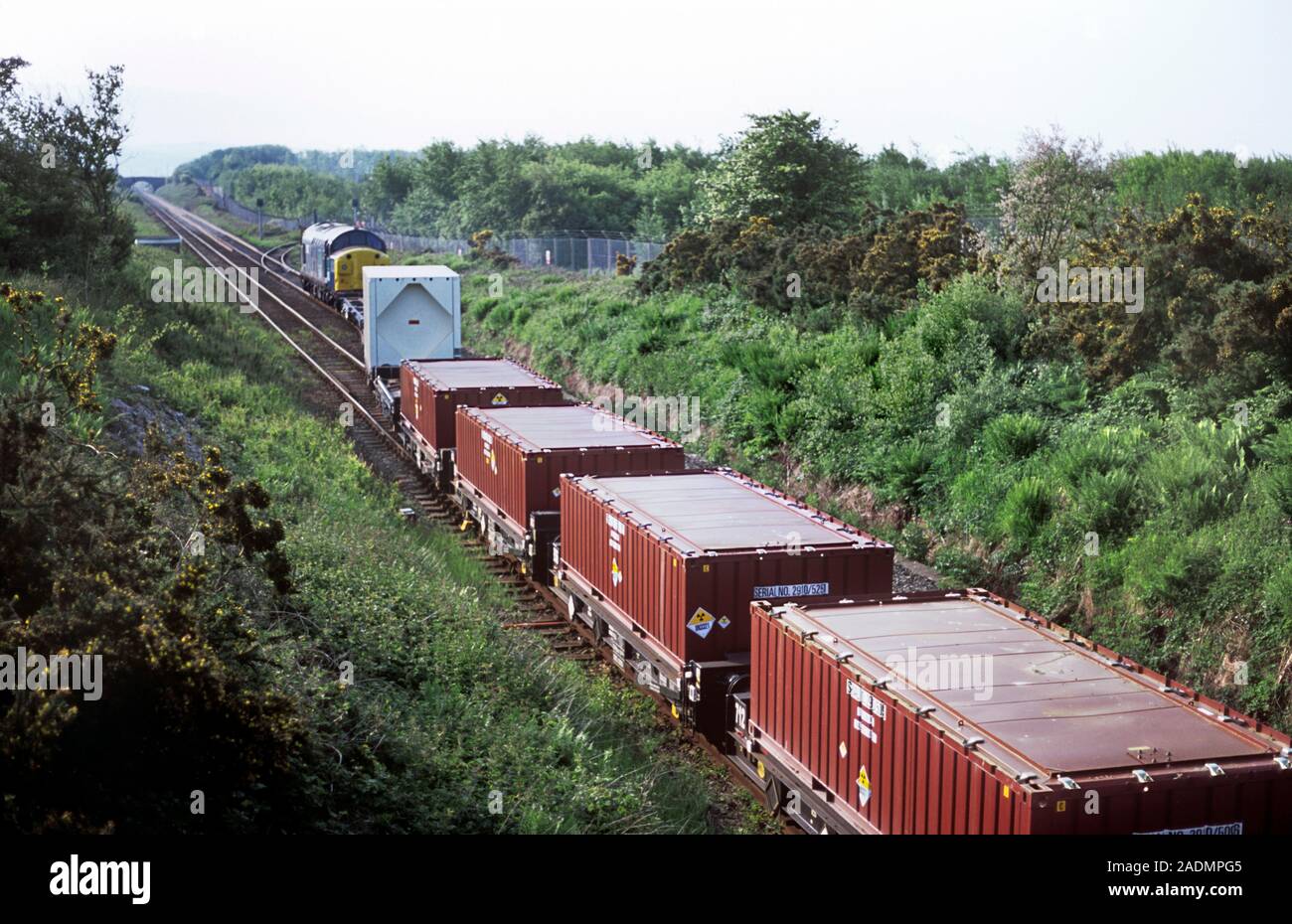 Nuclear waste. Train transporting containers of low-level radioactive ...