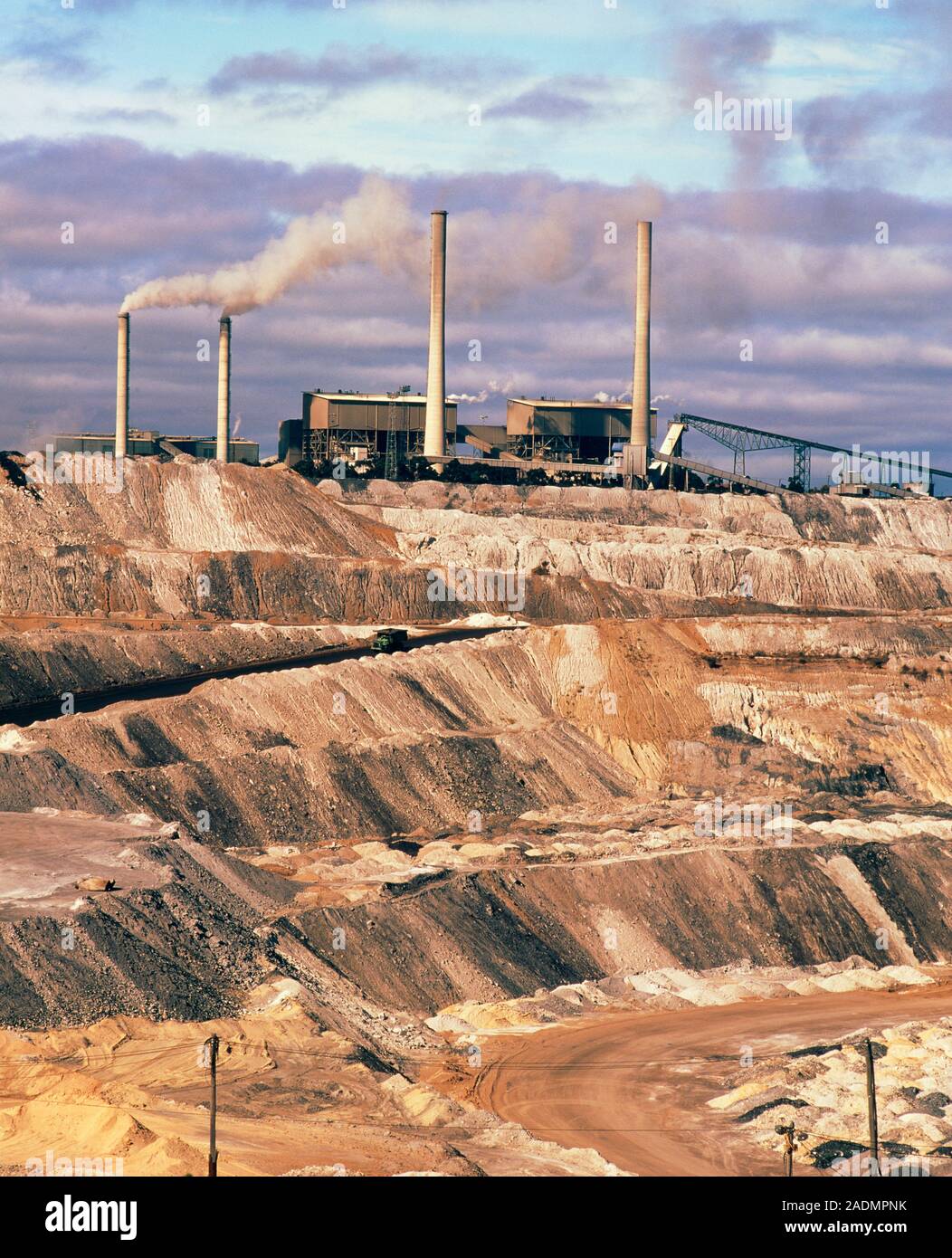 Coal-fired power station. A coal-fired power station and open-cast coal ...