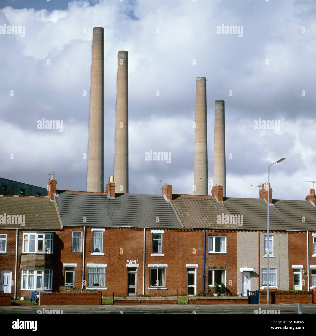 Power station chimneys behind a row of terraced houses. This is Blyth ...