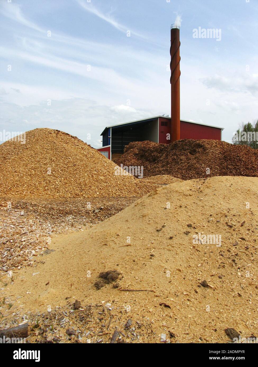 Biomass power plant. Piles of wood chips at a wood-fuelled power ...