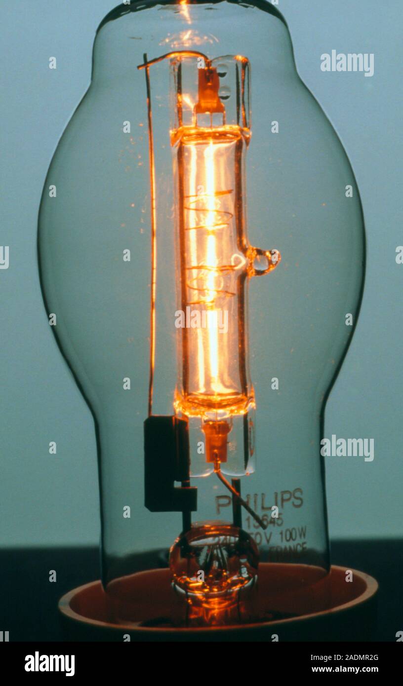 A tungsten-halogen lamp. In these lamps the filament, a wire made of ...