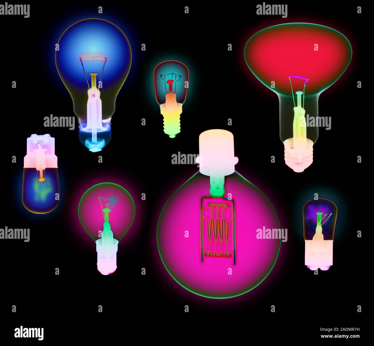 Light bulbs. Coloured X-ray of an assortment of electric light bulbs ...
