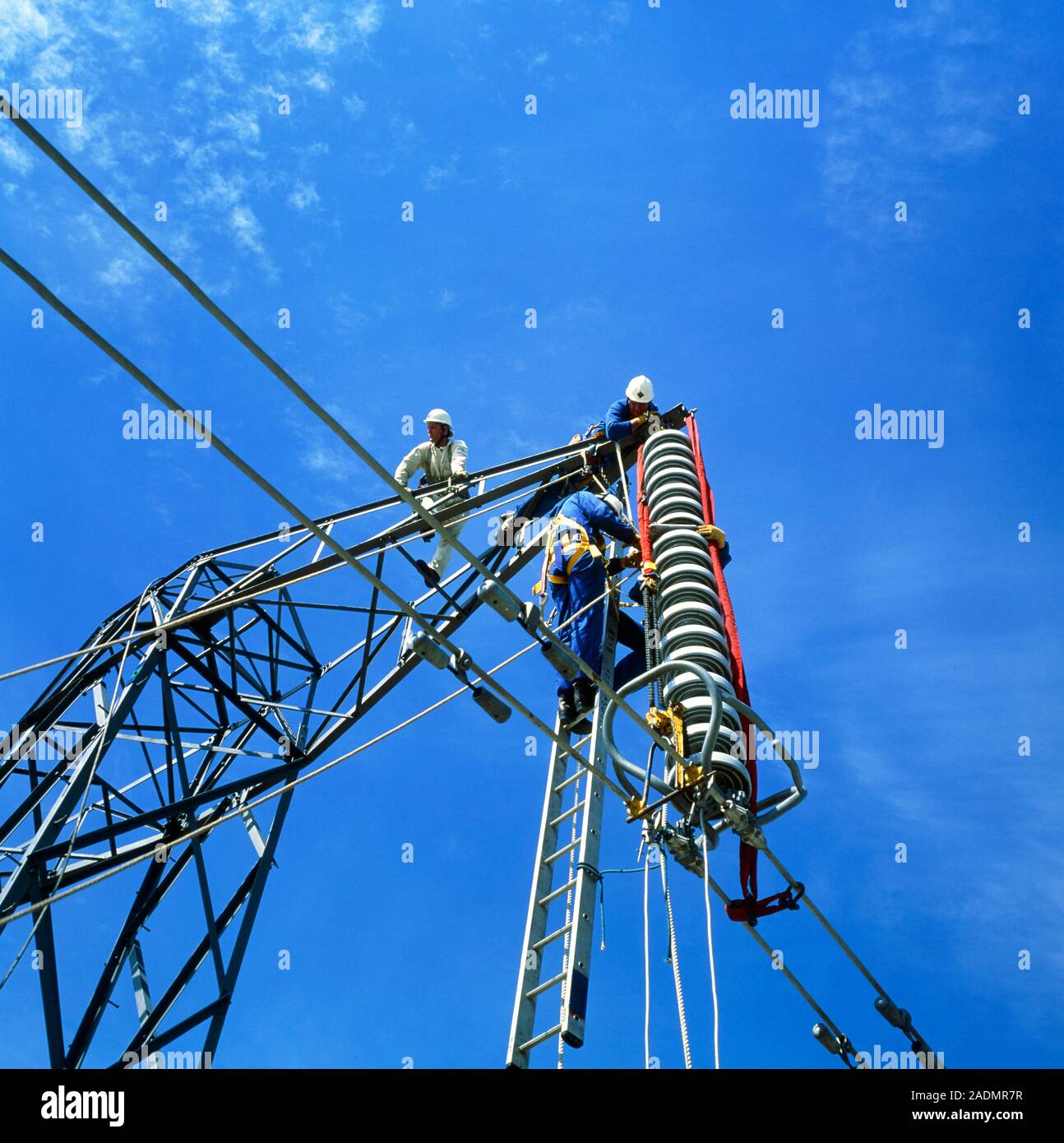 Electricity pylon maintenance. View of several technicians during ...