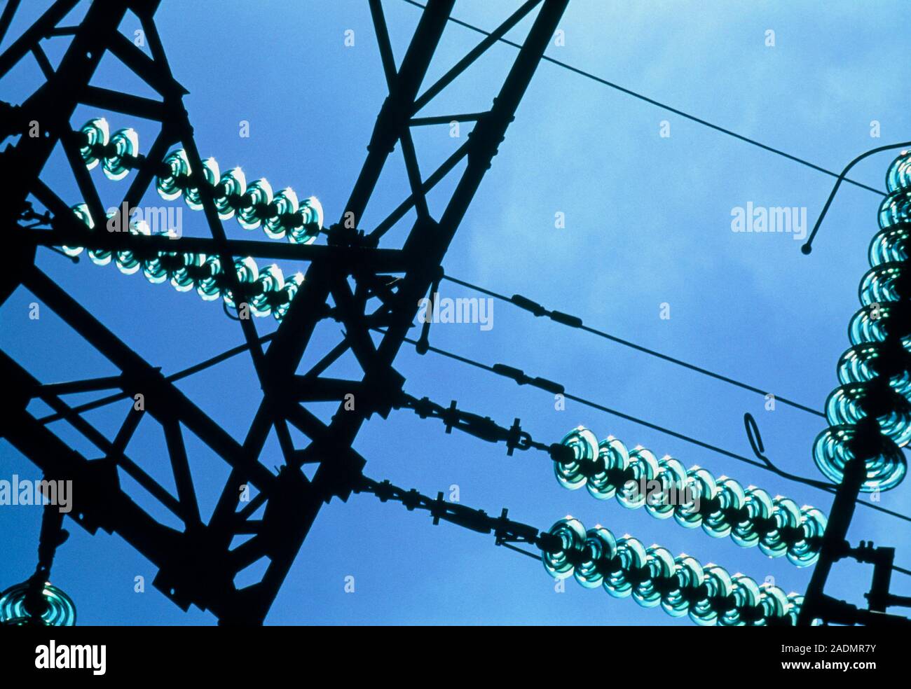 Electricity cables. View of electricity cables and insulators joined to ...