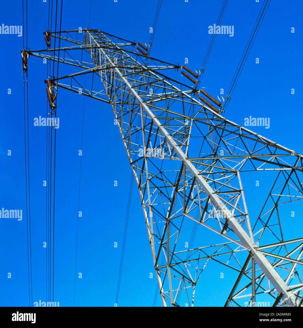 Electricity pylon. View of an electricity pylon carrying high voltage ...