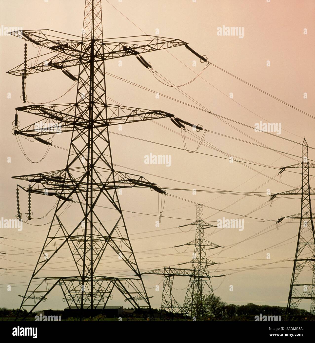 Electricity pylons. Electricity pylons carrying high voltage wires. The ...